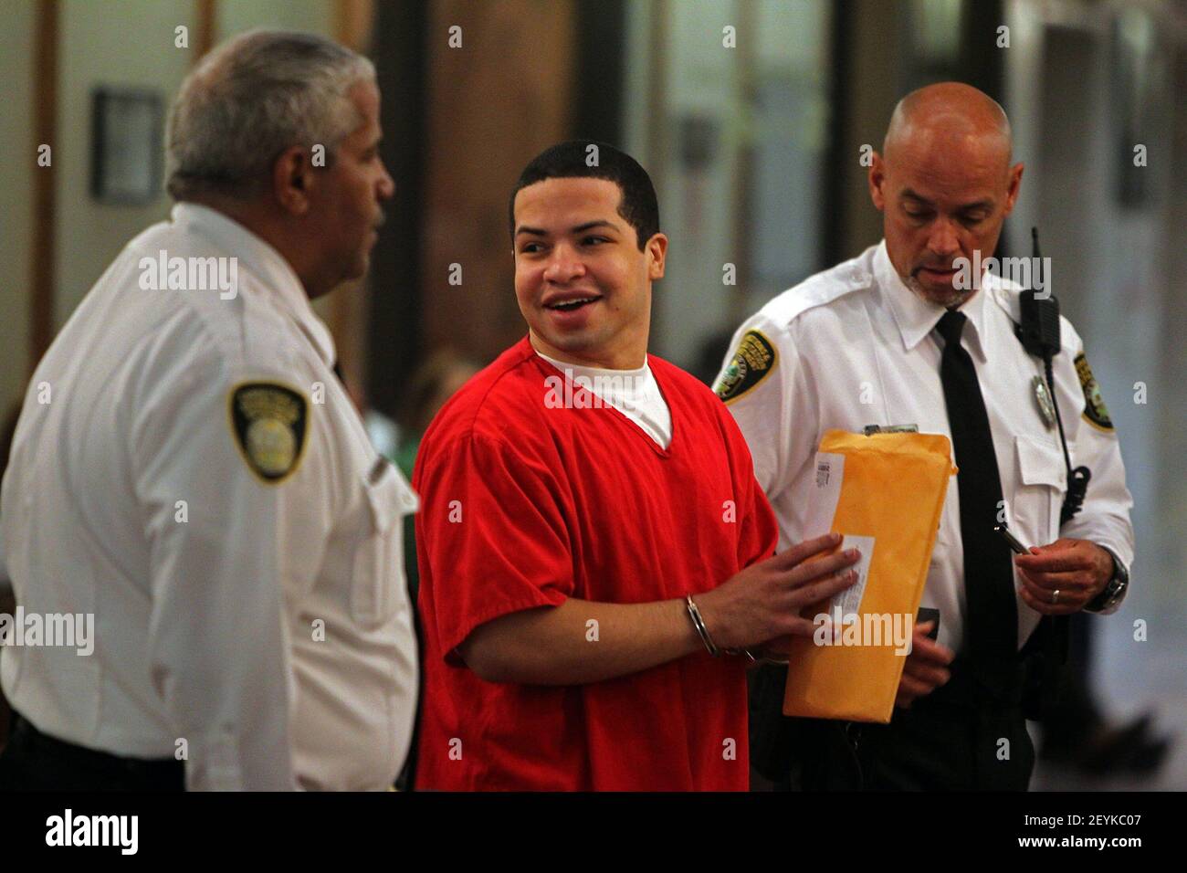 Eric Rivera Jr. is moved to the courtroom during his murder trial in ...