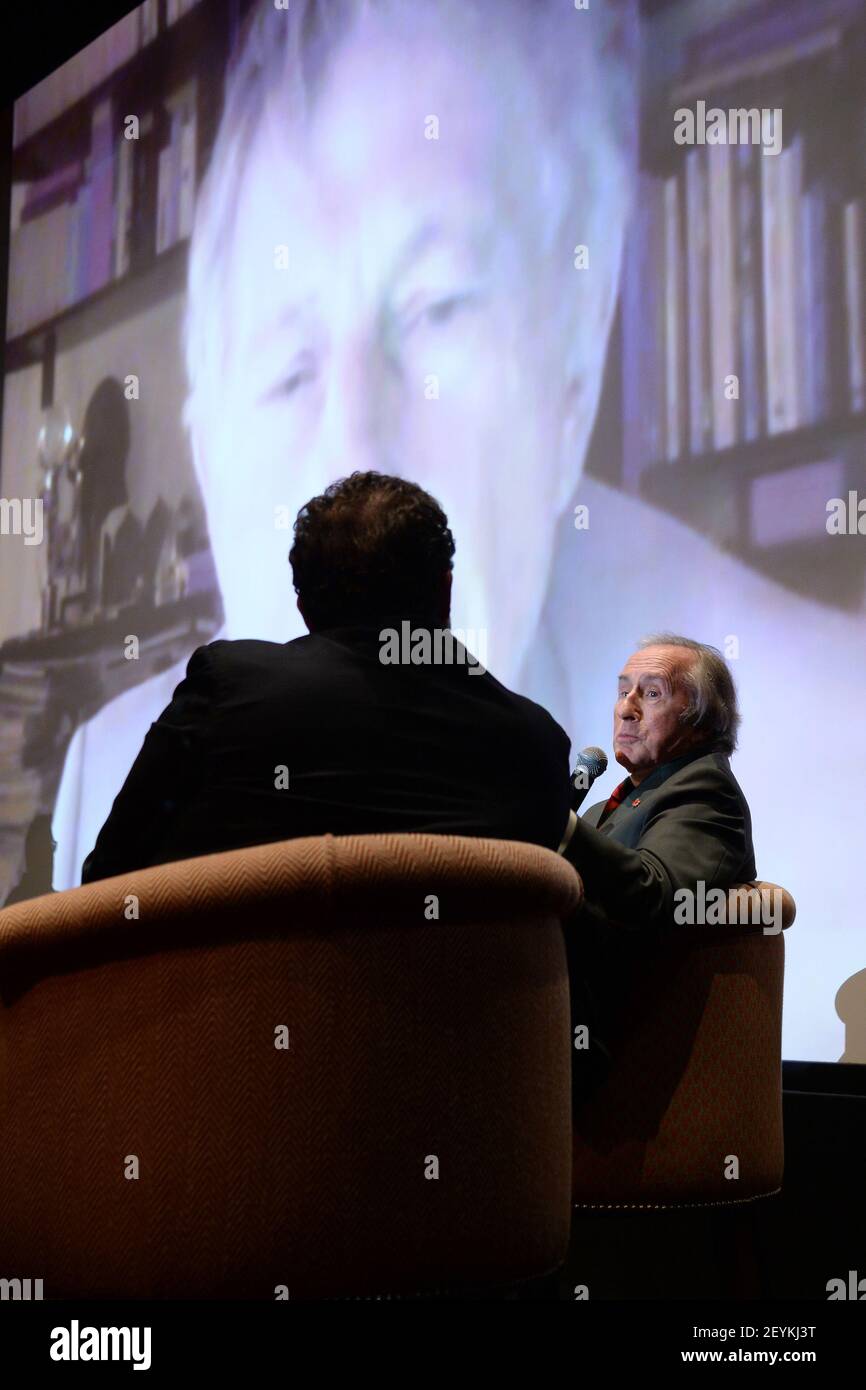 (L-R) Director Brett Ratner (in silhouette) and Three time World ...