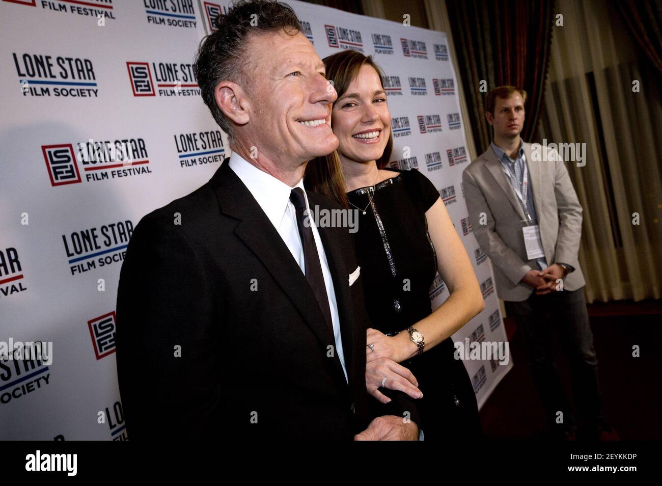 Lyle Lovett and April Kimble walk the red carpet before he received the ...