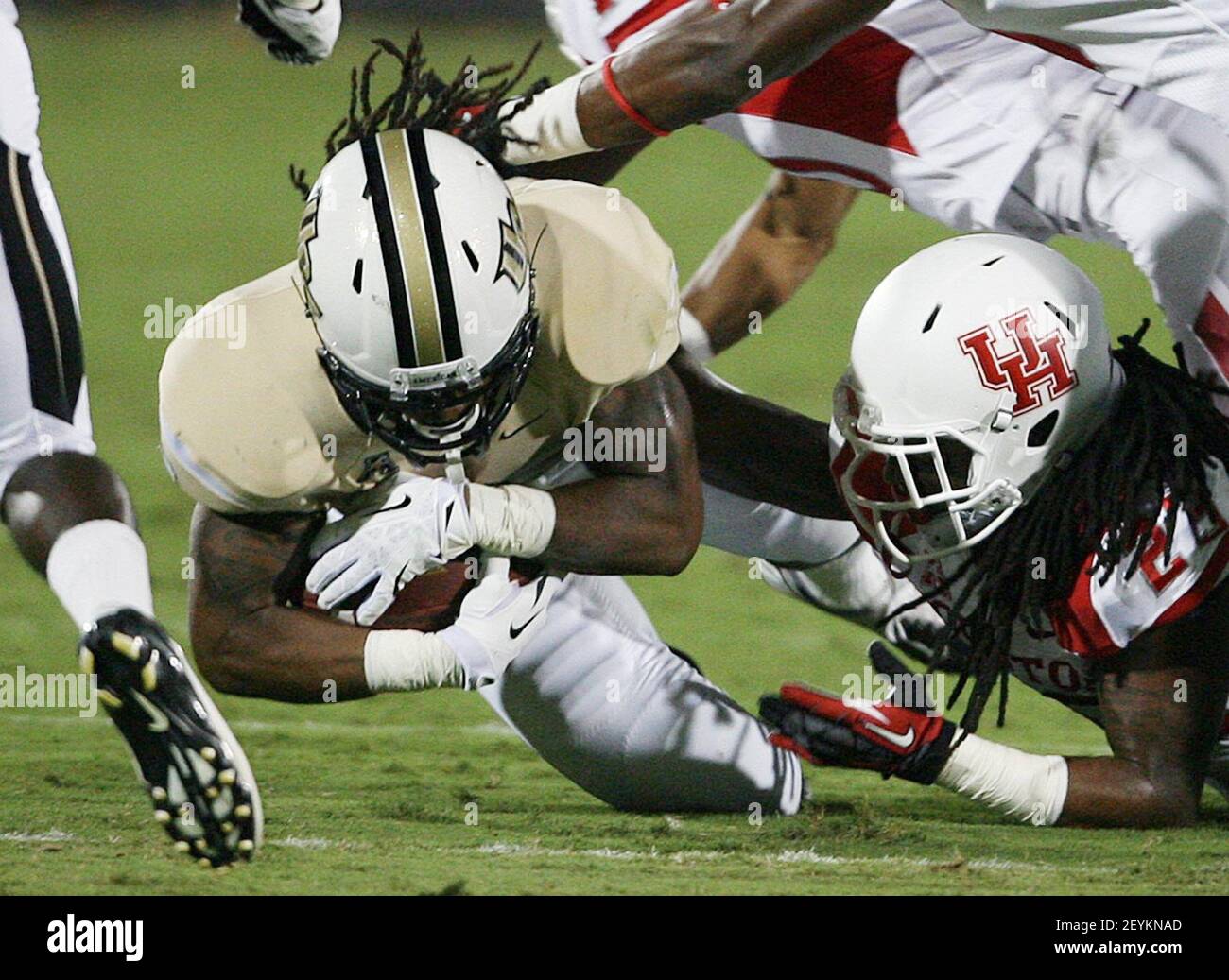 Wide receiver Rannell Hall of Central Florida lunges for extra yardage ...