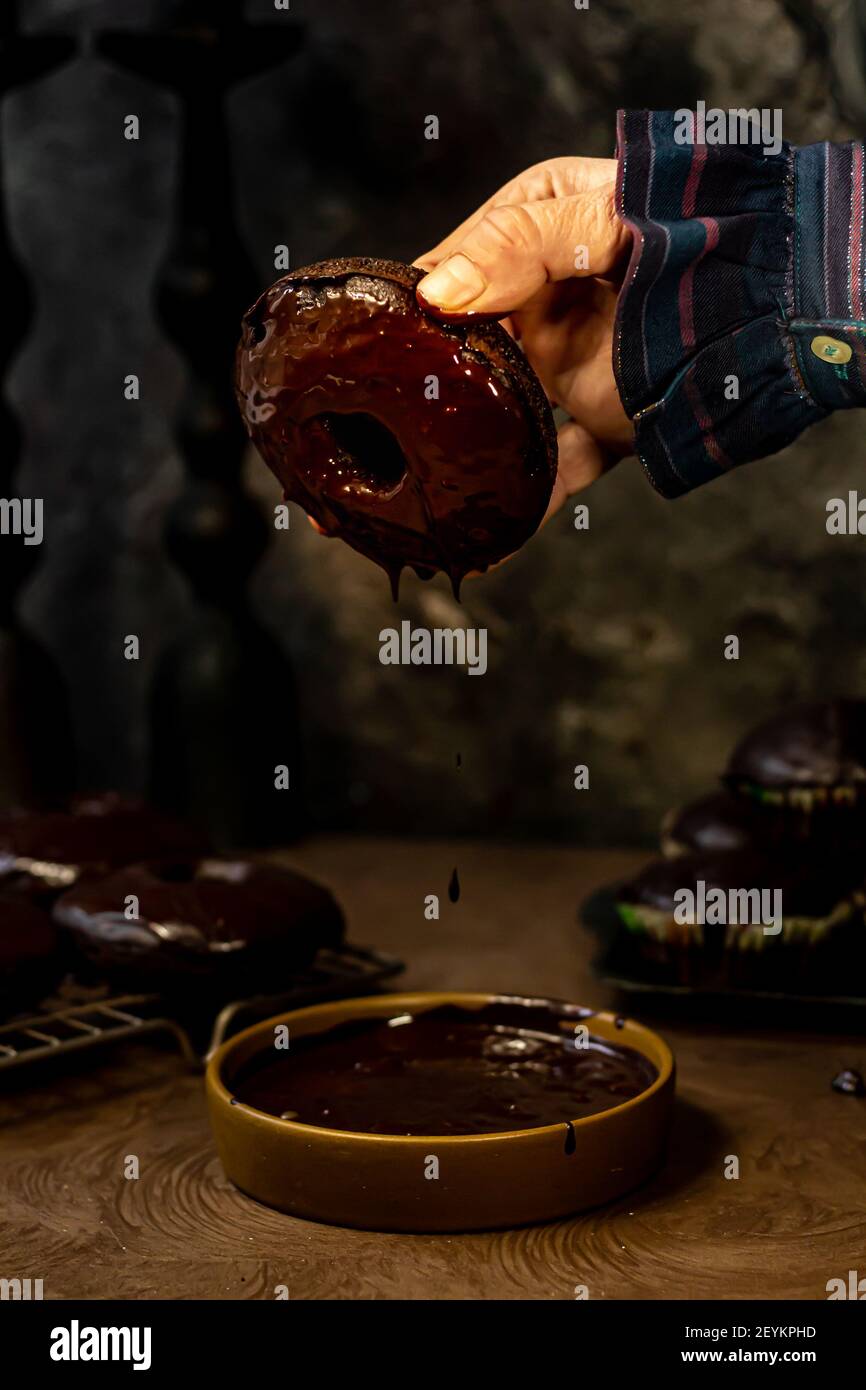 Chocolate donuts in glaze hi-res stock photography and images - Alamy