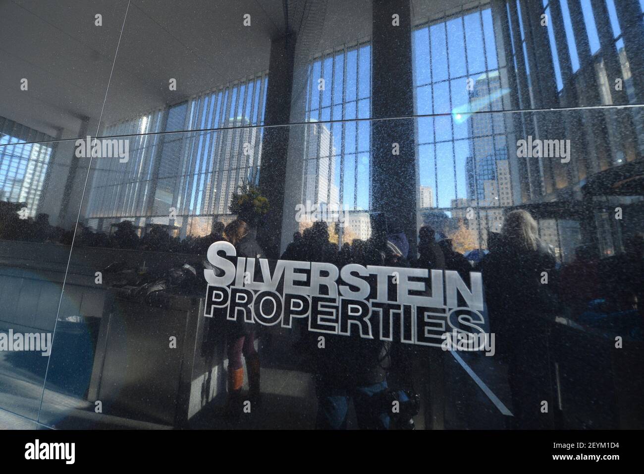 Etched "Silverstein Properties" on the marble lobby wall of Four World ...