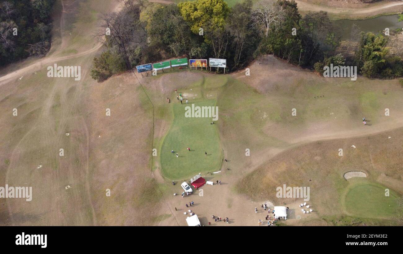 Kathmandu, Nepal. 6th Mar, 2021. An aerial view of golfers playing golf ...