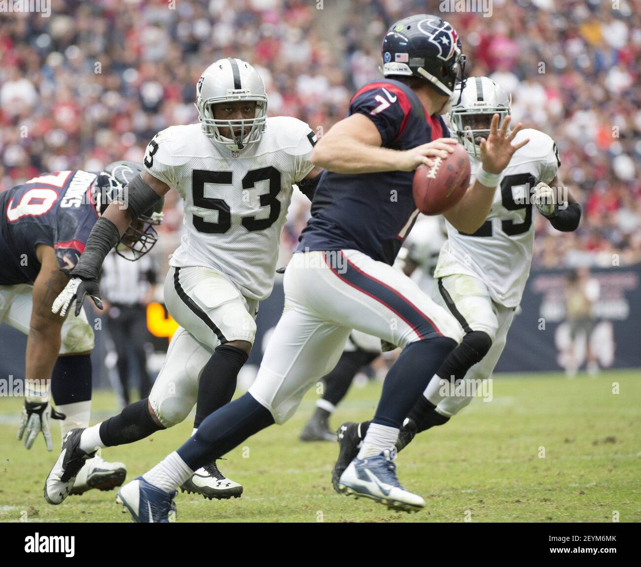 Nick Roach (53) of the Oakland Raiders pursues quarterback Case Keenum ...