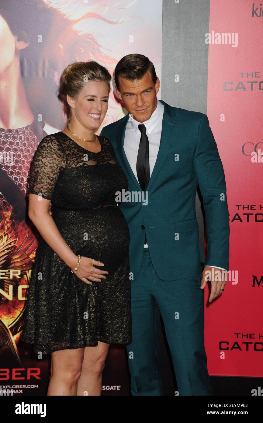 Catherine Ritchson, Alan Ritchson attends The Hunger Games: Catching ...
