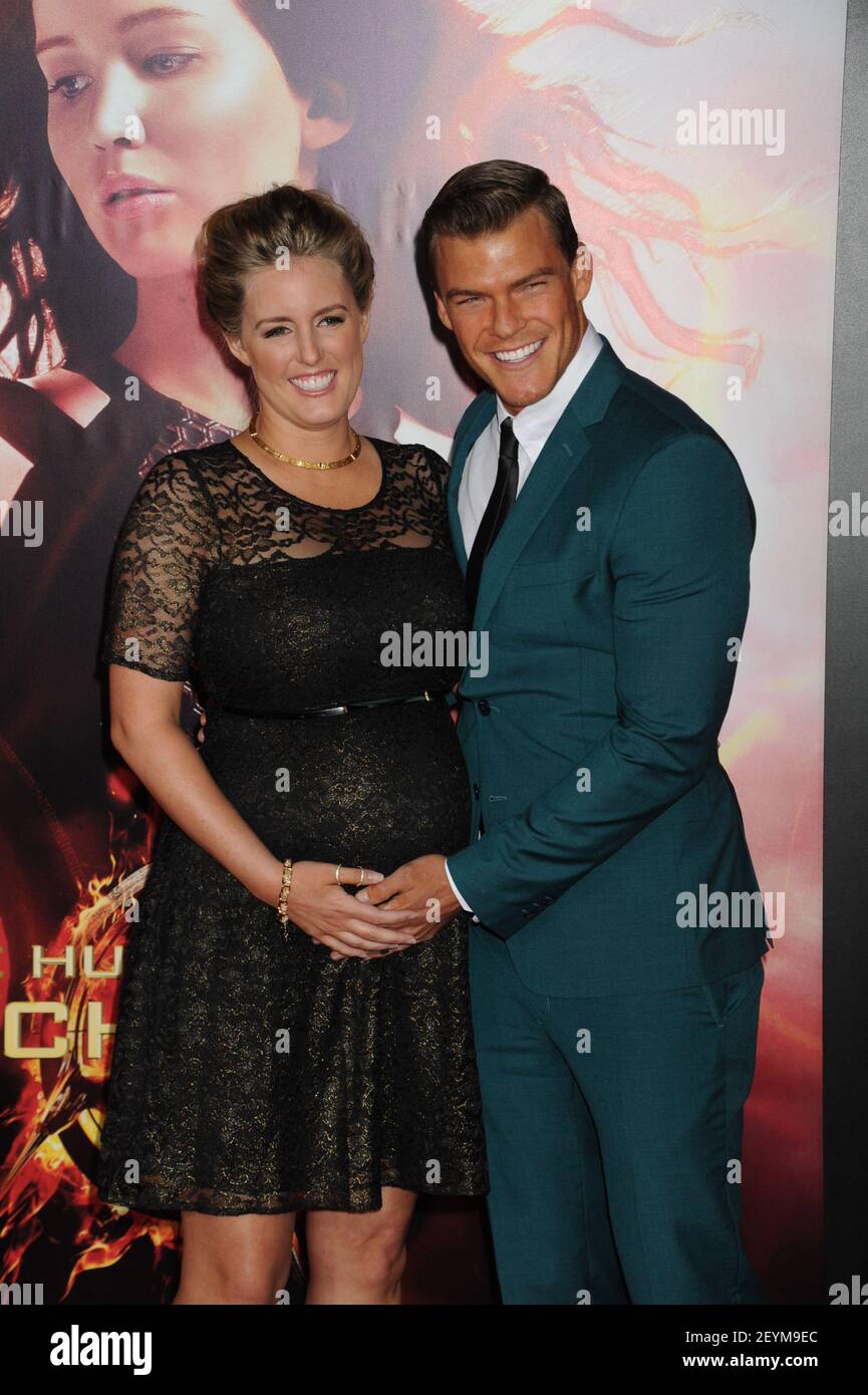 Catherine Ritchson, Alan Ritchson attends The Hunger Games: Catching ...
