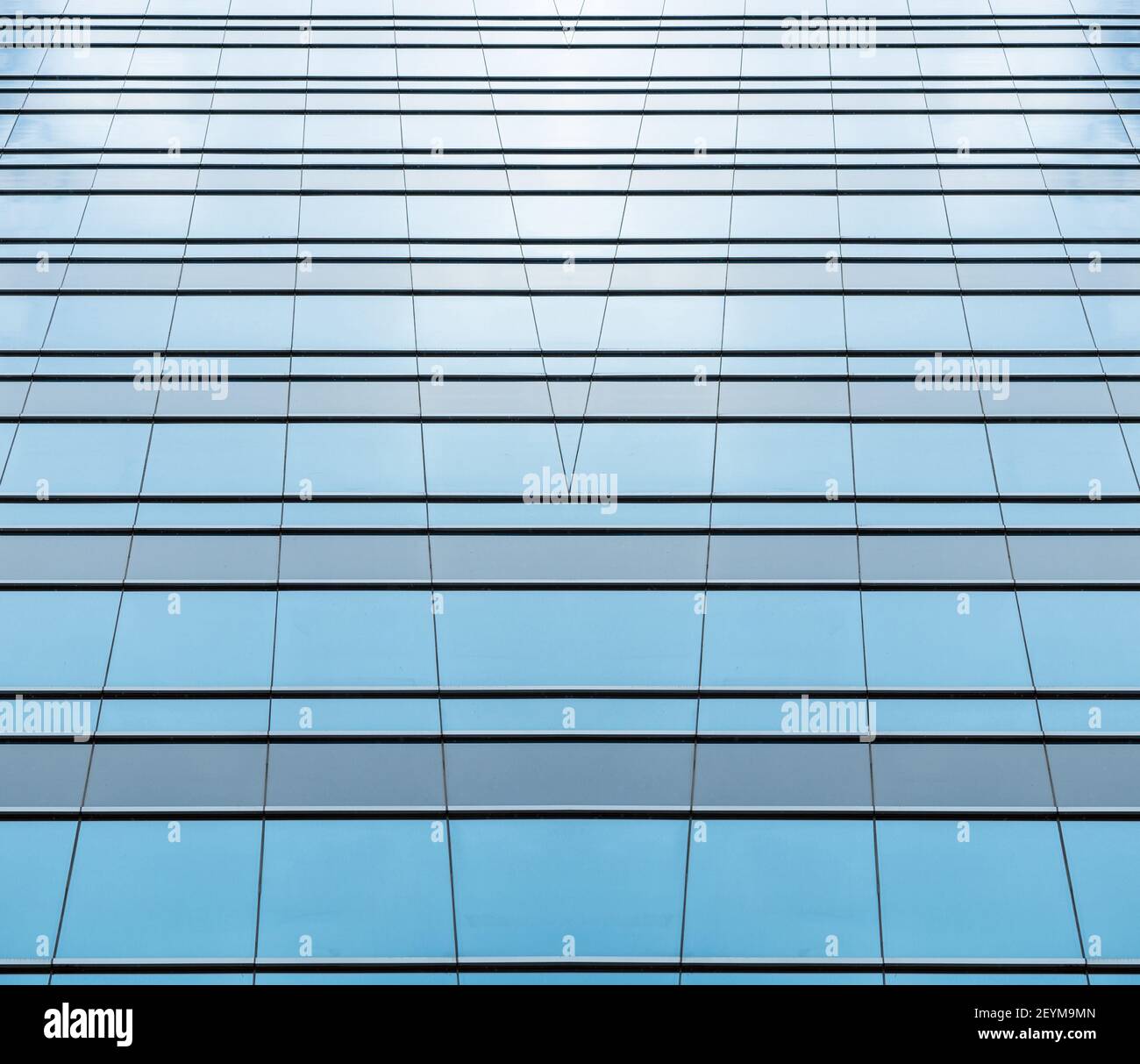 underside panoramic and perspective view to steel blue glass high rise ...