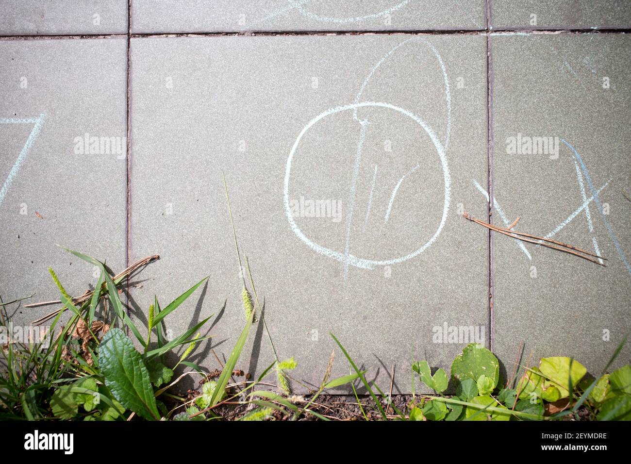 Chalk drawings on park ceramic tiles. Photo can be used as a whole ...