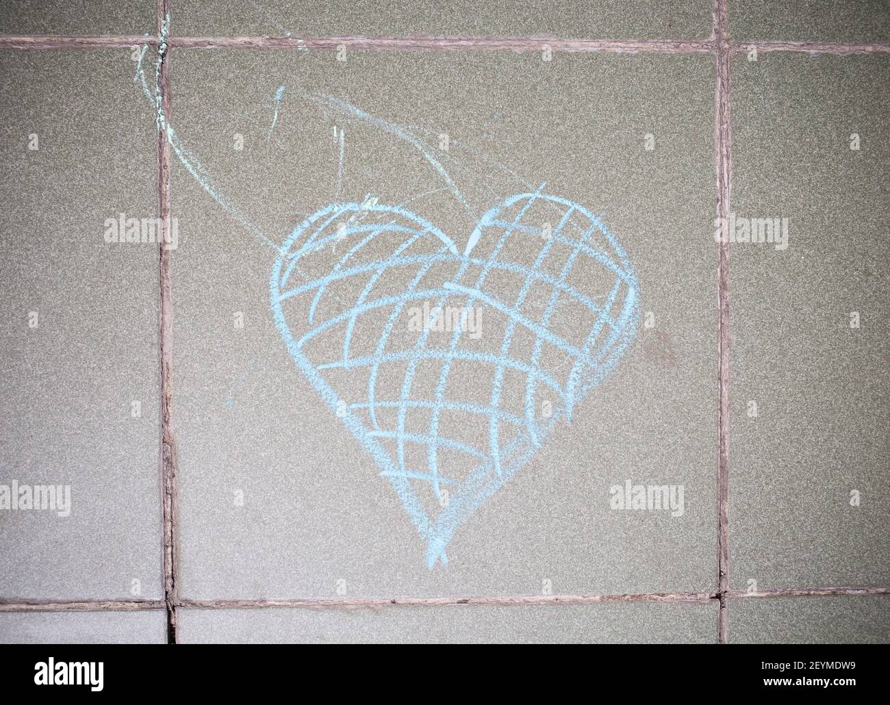 Chalk drawings on park ceramic tiles. Photo can be used as a whole ...