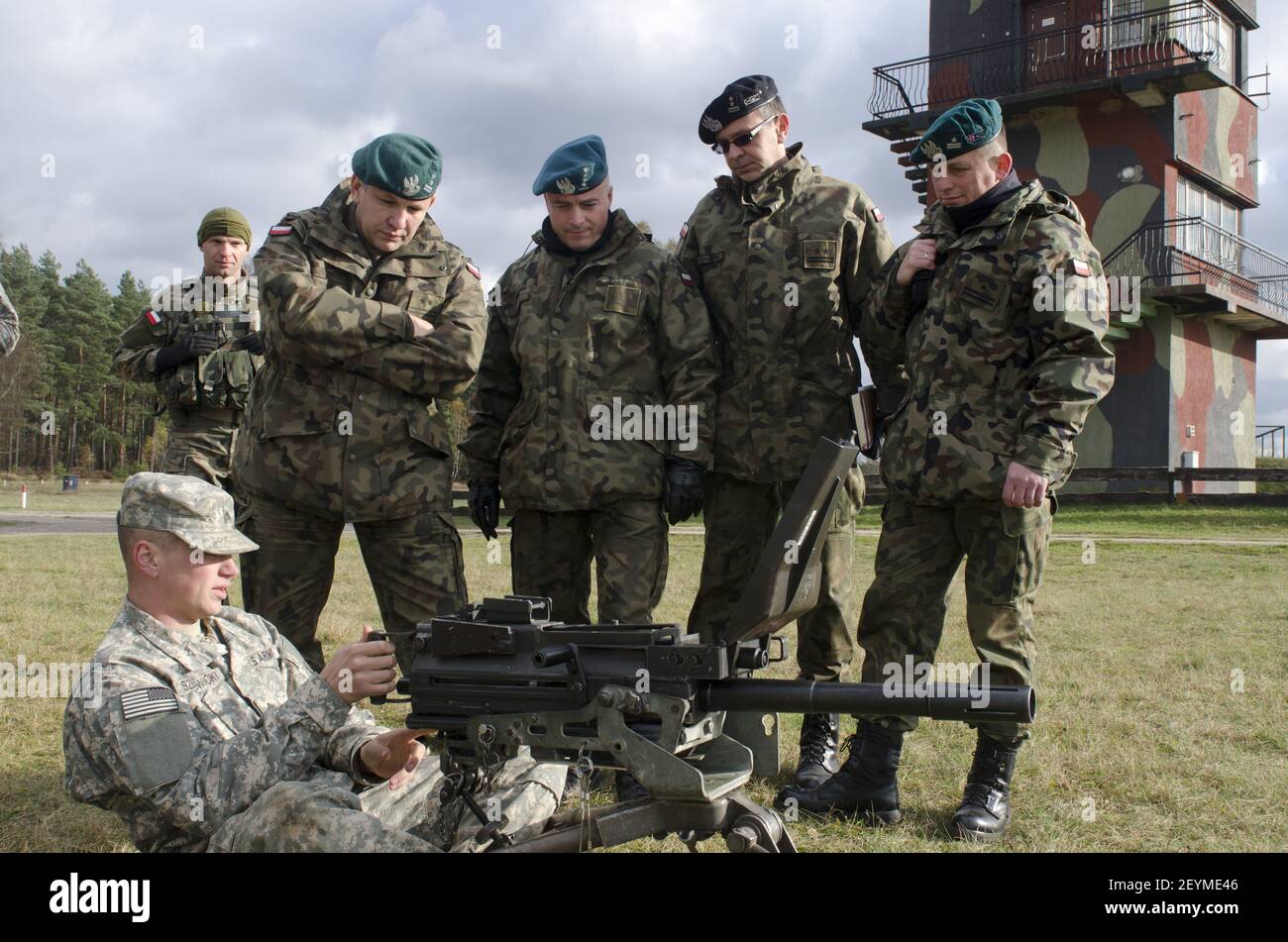 U.S. Army Sgt. Jeffrey M. Szelewicki, seated, a cavalry scout with ...