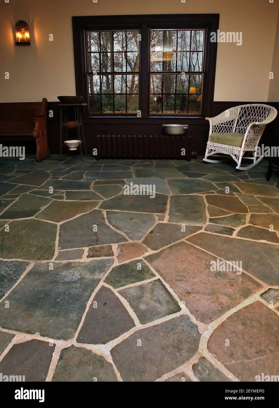 A floor made of flagstones that were originally used for the sidewalks ...
