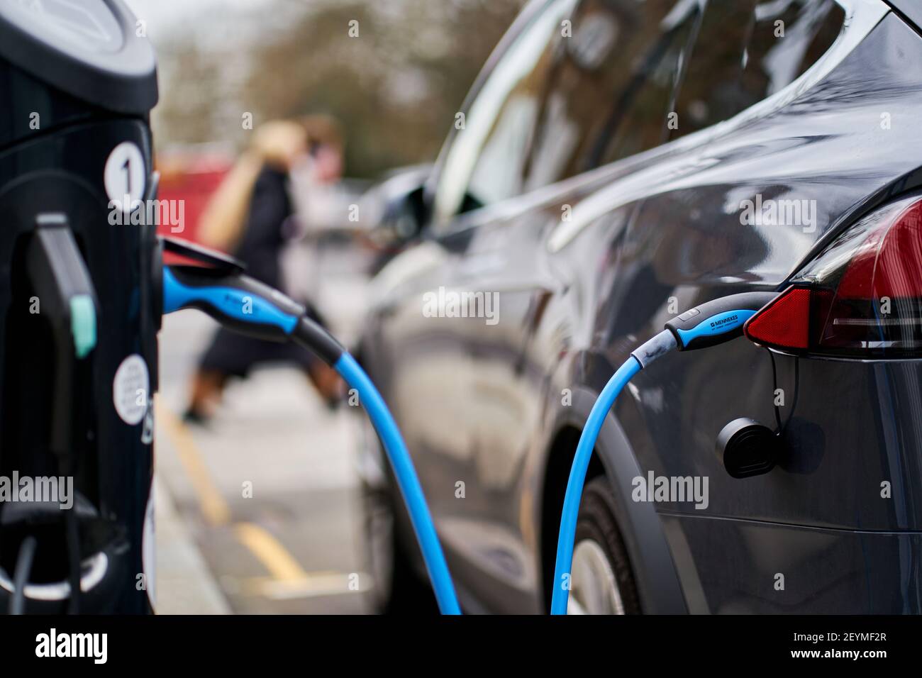 A Tesla car using a Source London EV charging point, London. Picture ...