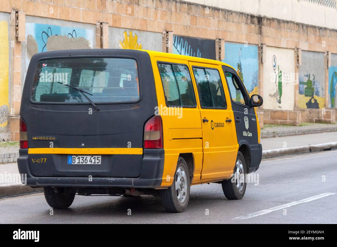 Cuba Taxi van driving in Santa Clara, Cuba Stock Photo - Alamy
