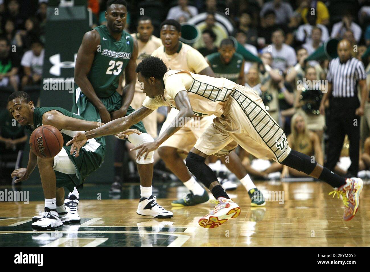South Florida guard Corey Allen Jr. (Photo by 4) steals the ball from Stetson guard Raekwon ...