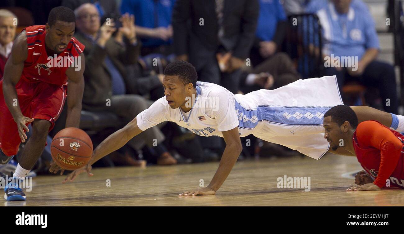 North Carolina's Nate Britt goes after a loose ball between Richmond's ...
