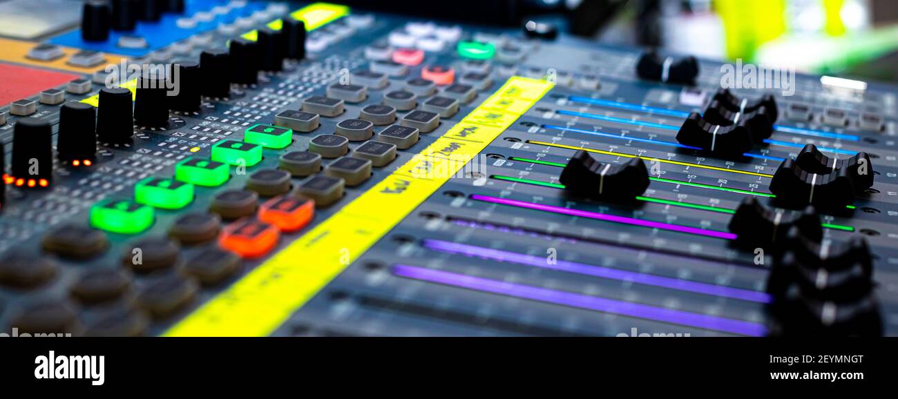 Close up of Sliders and buttons on Audio Mixing Desk at live event ...