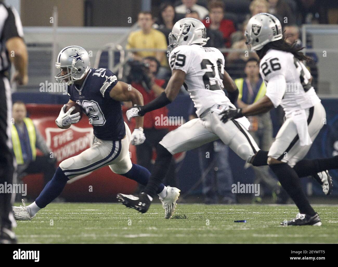 Dallas Cowboys' Miles Austin picks up 19 yards against the Oakland ...