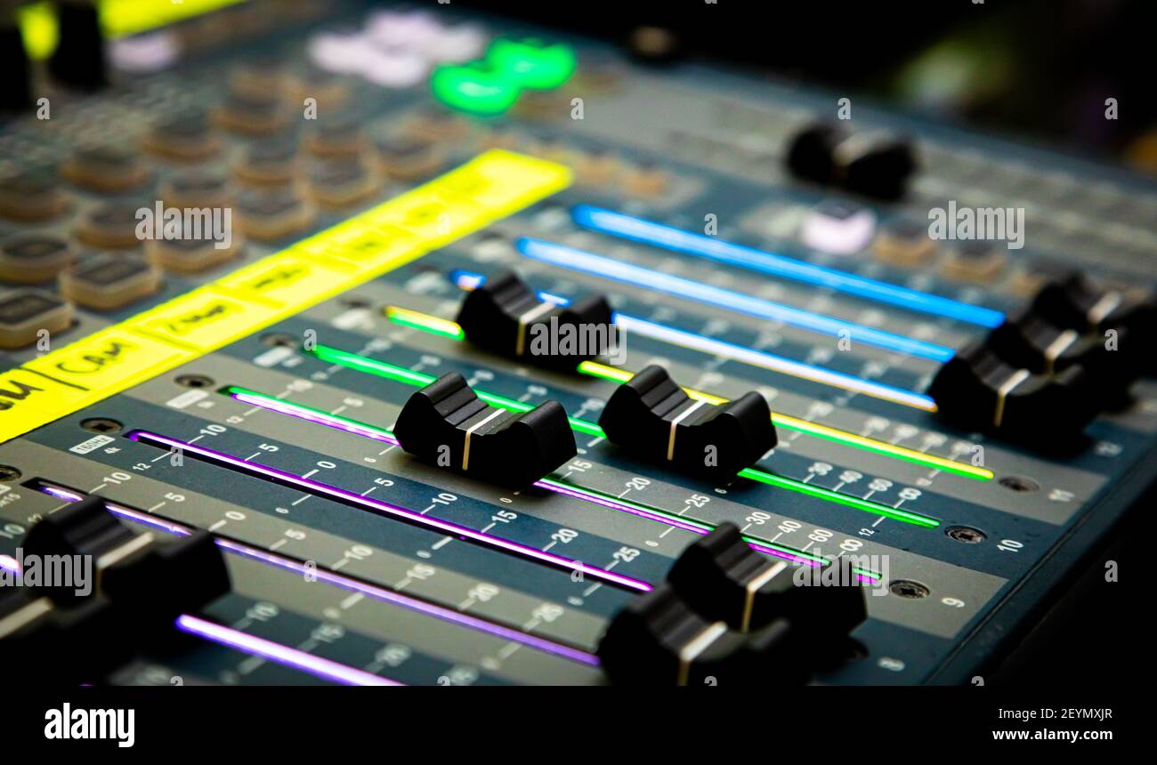 Close up of Sliders and buttons on Audio Mixing Desk at live event ...