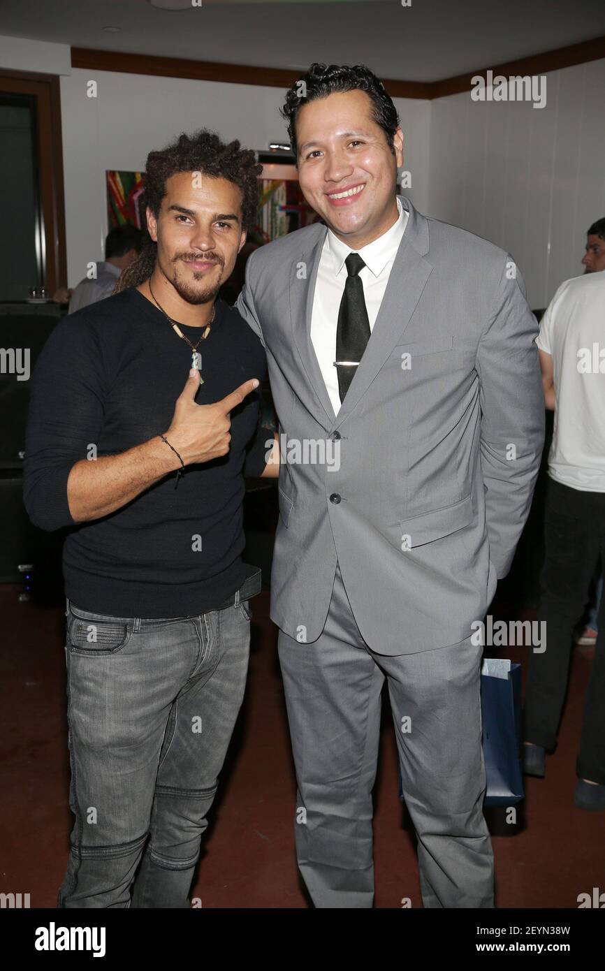 Singer/ composer Fabian Hernandez and Mike Scull attend Domingo Zapata ...