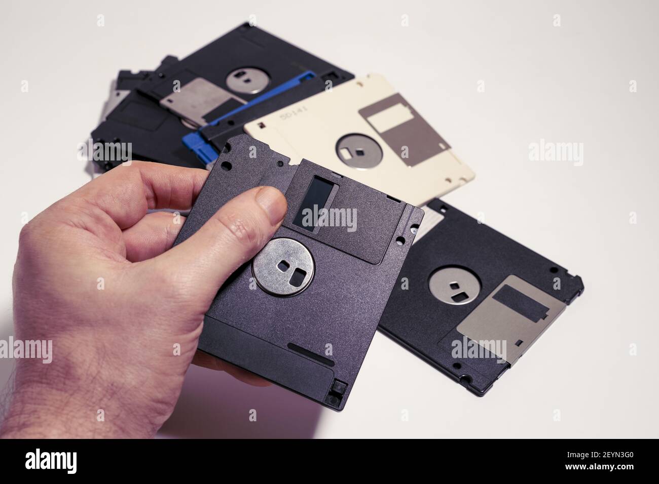 Hand holding floppy disk hi-res stock photography and images - Alamy