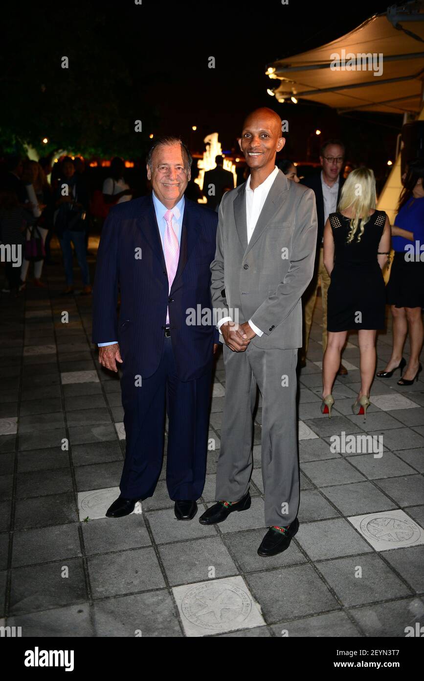 International Artist Victor Matthews (R) and Chairman of Miami Children ...