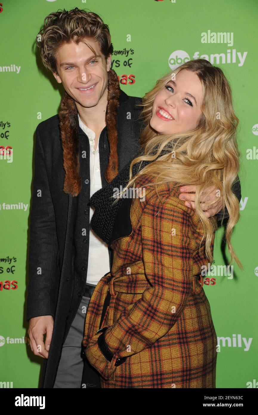 L-R: Keegan Allen, Sasha Pieterse attend the ABC Family's 25 Days Of ...