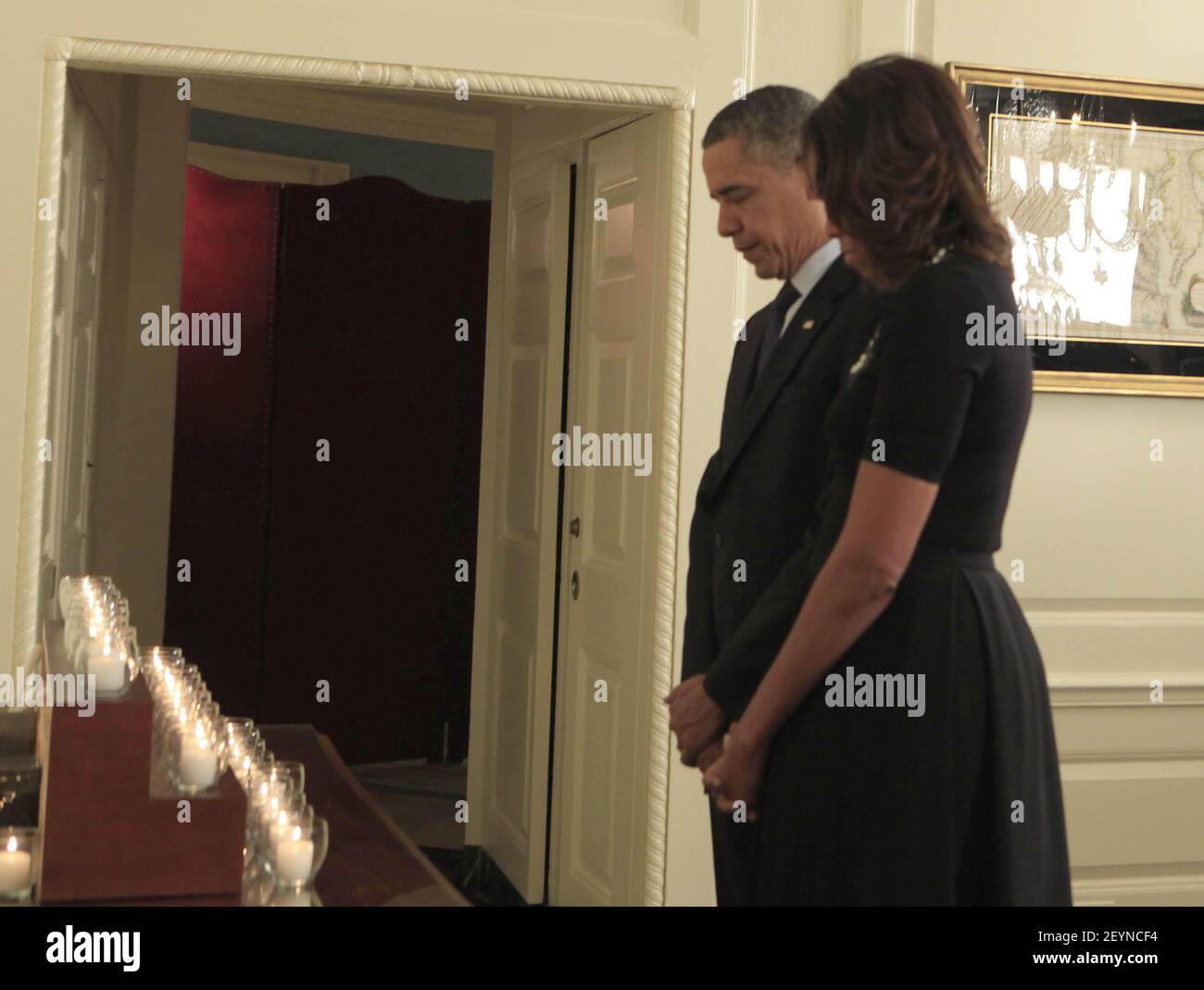 President Barack Obama and First Lady Michelle Obama participate in a ...