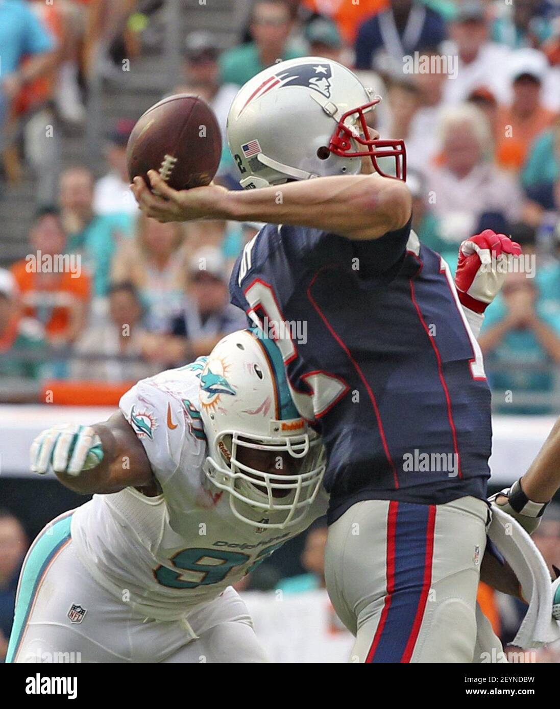 Miami Dolphins' Cameron Wake hits New England Patriots quarterback Tom ...