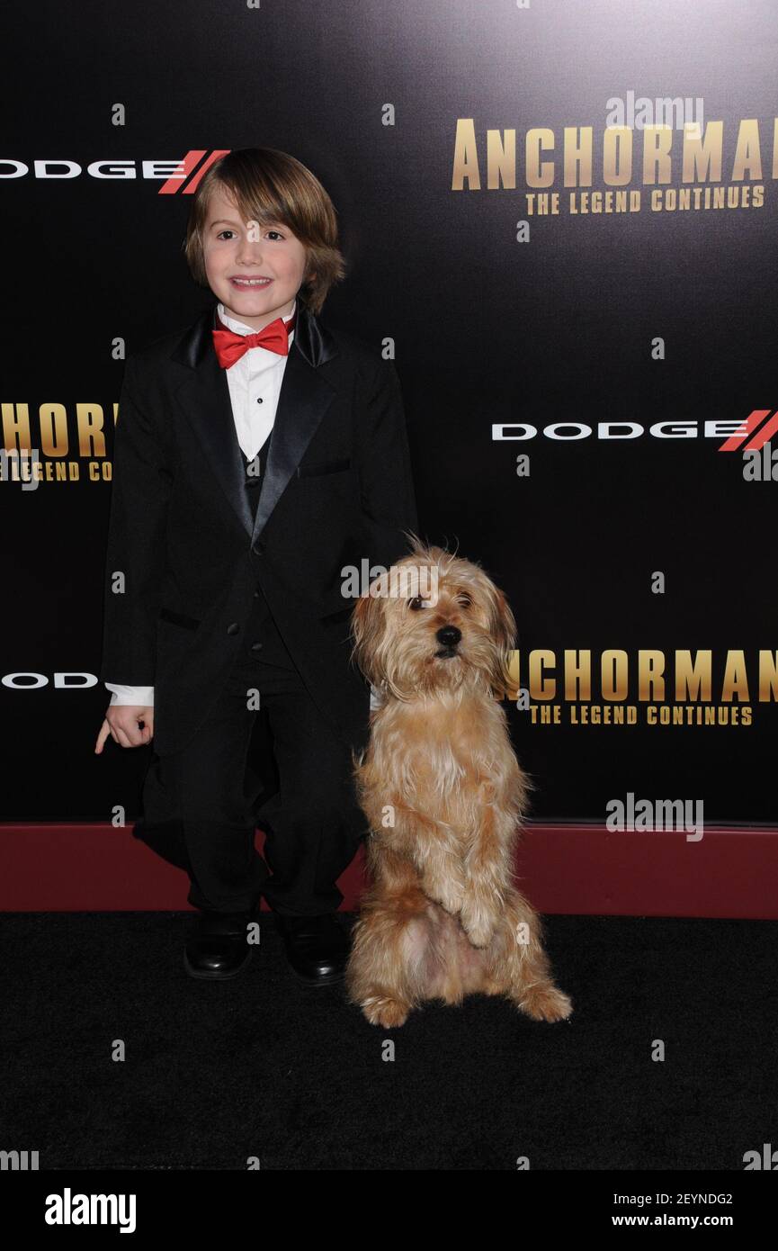 Judah Nelson, Baxter the Dog attends the Anchorman 2: The Legend ...