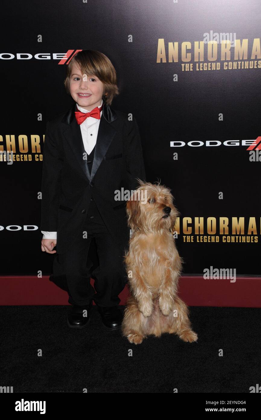 Judah Nelson, Baxter the Dog attends the Anchorman 2: The Legend ...