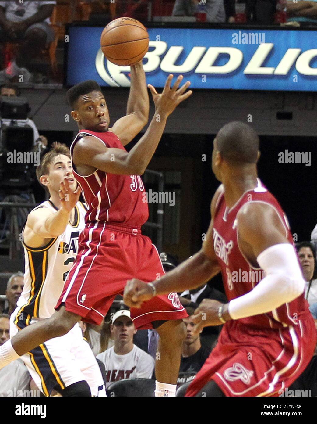 Miami Heat's Norris Cole gets a rebound against Utah Jazz's Gordon ...