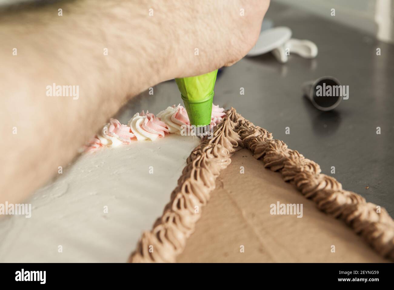 Hand Decorating Cake Stock Photo - Alamy