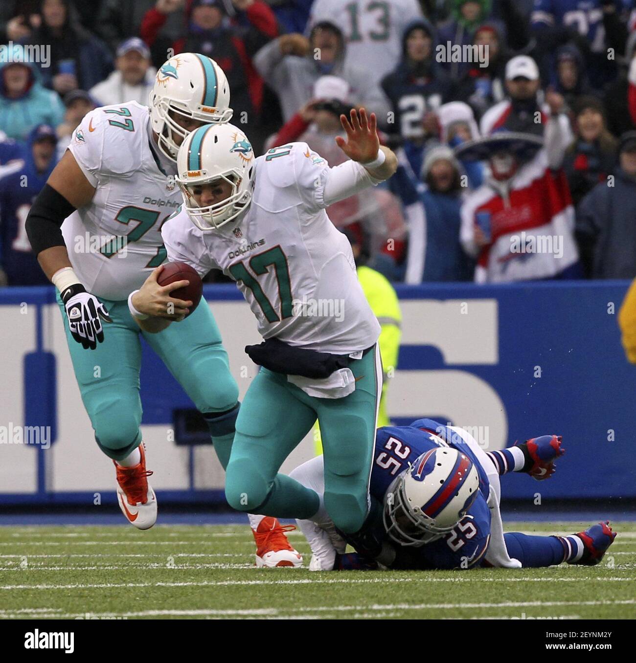 Miami Dolphins quarterback Ryan Tannehill is sacked by the Buffalo ...