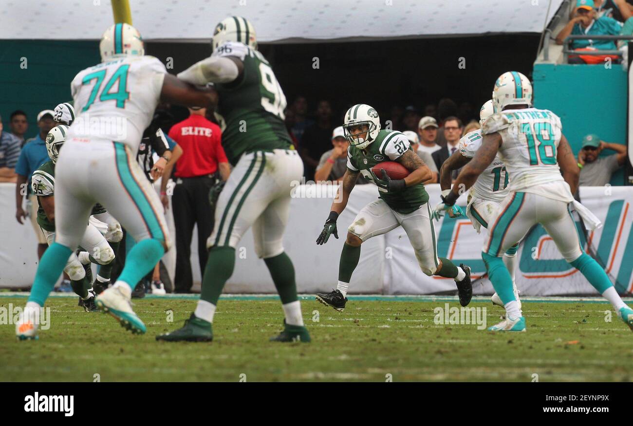 New York Jets' Jimmy Wilson intercepts a pass against the Miami ...