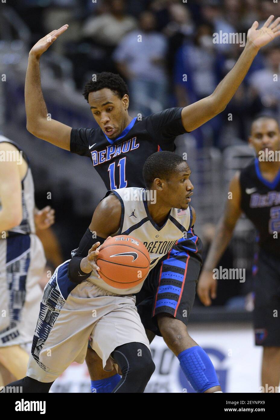 Georgetown forward Aaron Bowen (23) dribbles against DePaul forward ...