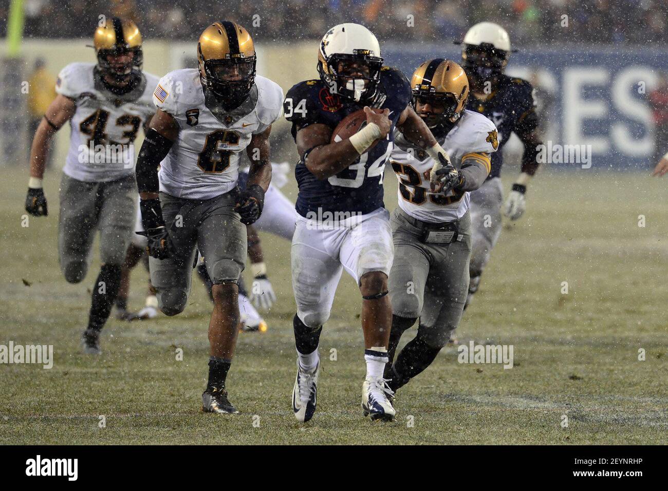 Noah Copeland, center, a fullback with the U.S. Naval Academy football ...
