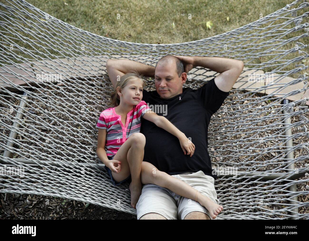 Sam Mitchell shares a quiet moment with his 7-year-old daughter Ranee ...