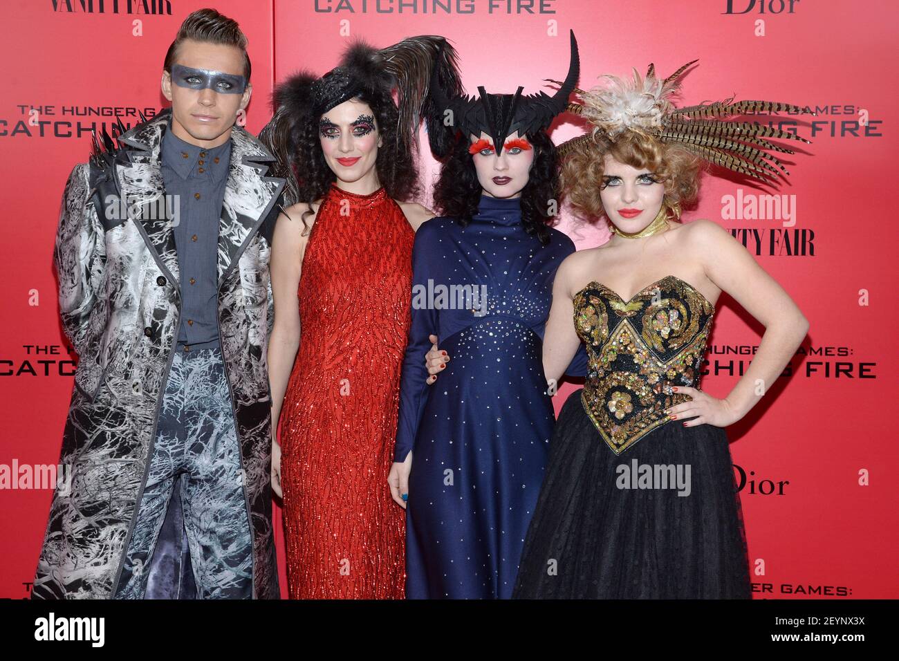 Models wearing costumes from the movie attend the special screening of ...
