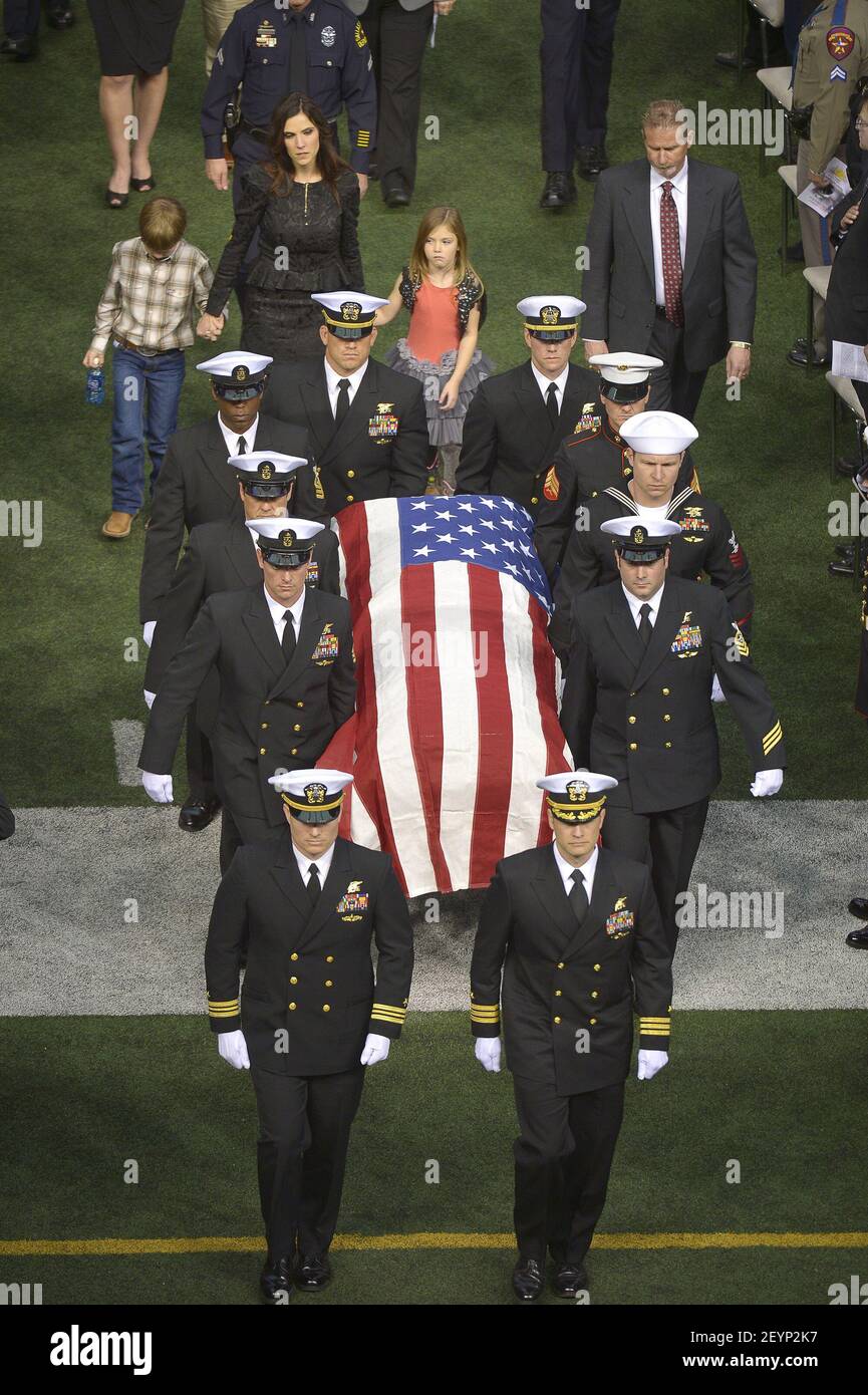 Taya Kyle and her two children follow the casket of her husband Chris ...