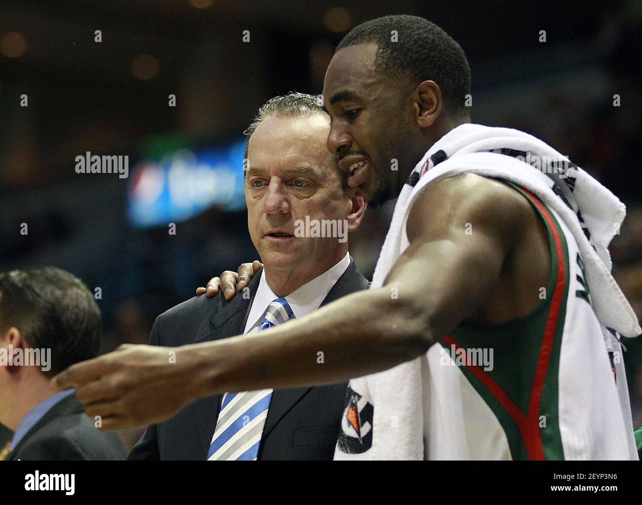 Milwaukee Bucks new head coach Jim Boylan talks with Luc Richard Mbah a ...