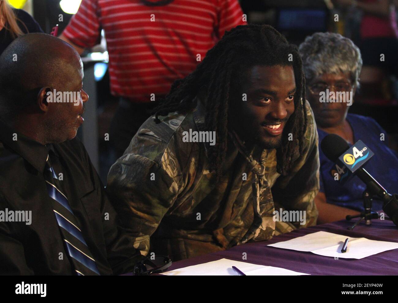 South Plantation running back Alex Collins sits down with his father ...