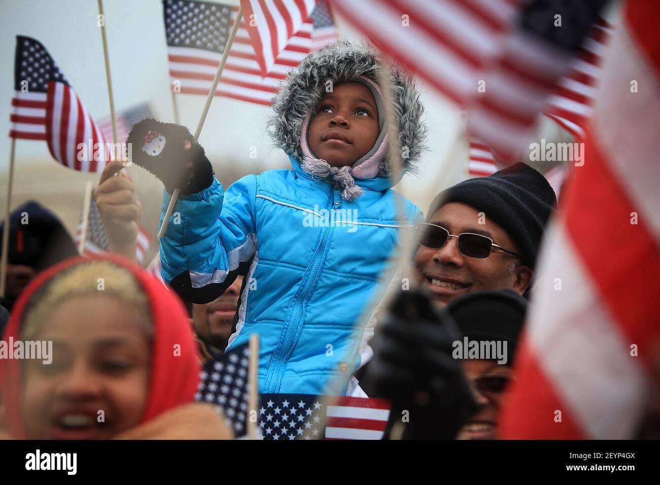 Addie Tucker, 5, of Atlanta, Georgia, holds on to David Tucker, 55 ...