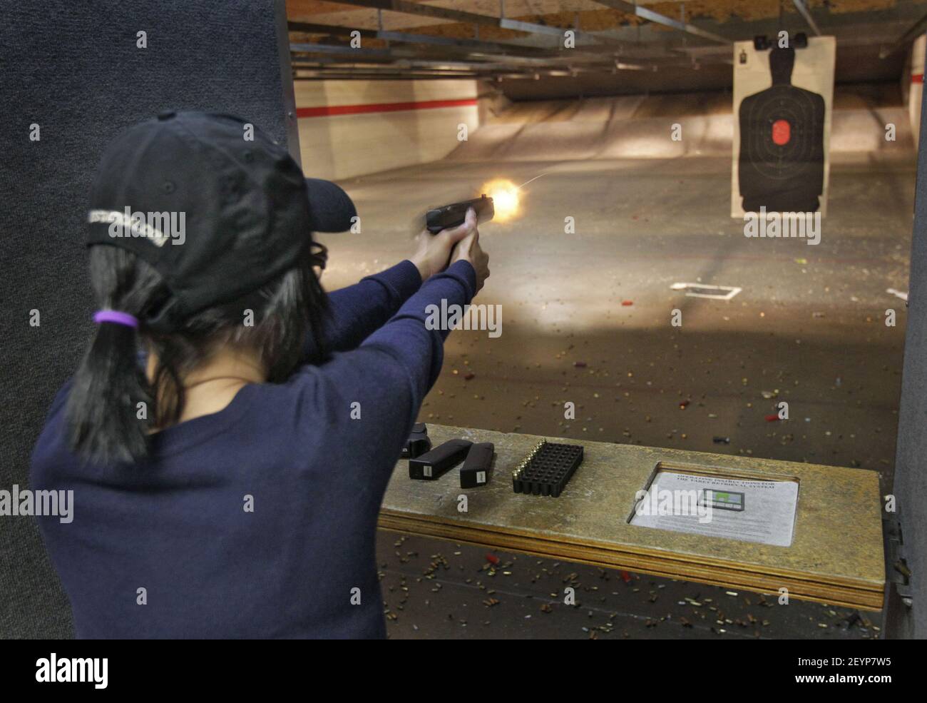 Chloe Morris, from Johns Creek, shoots her Glock 17 at the Bulls Eye ...
