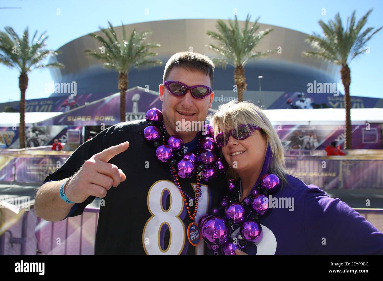 Baltimore Ravens fans Paul Thompson and Tracy Wheeler arrive for Super ...