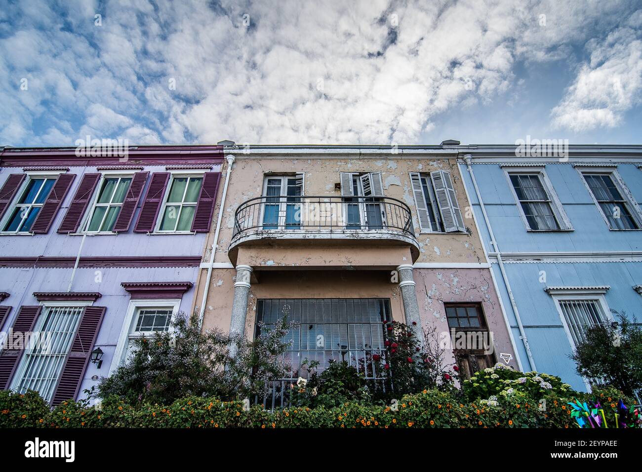 A low angle shot of old historic houses/building under the cloudy sky ...
