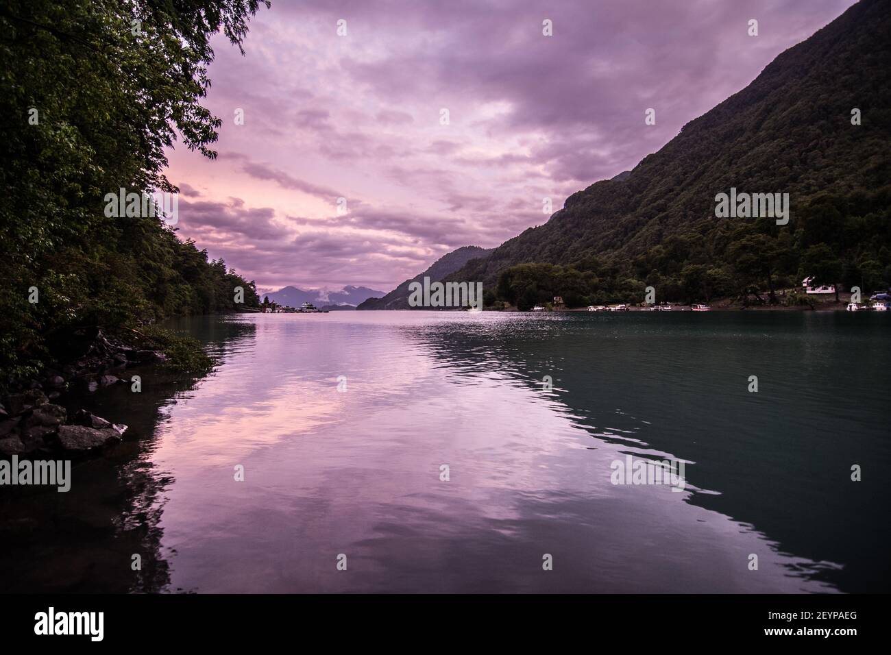 A beautiful calm river against the cloudy sky - perfect for background ...