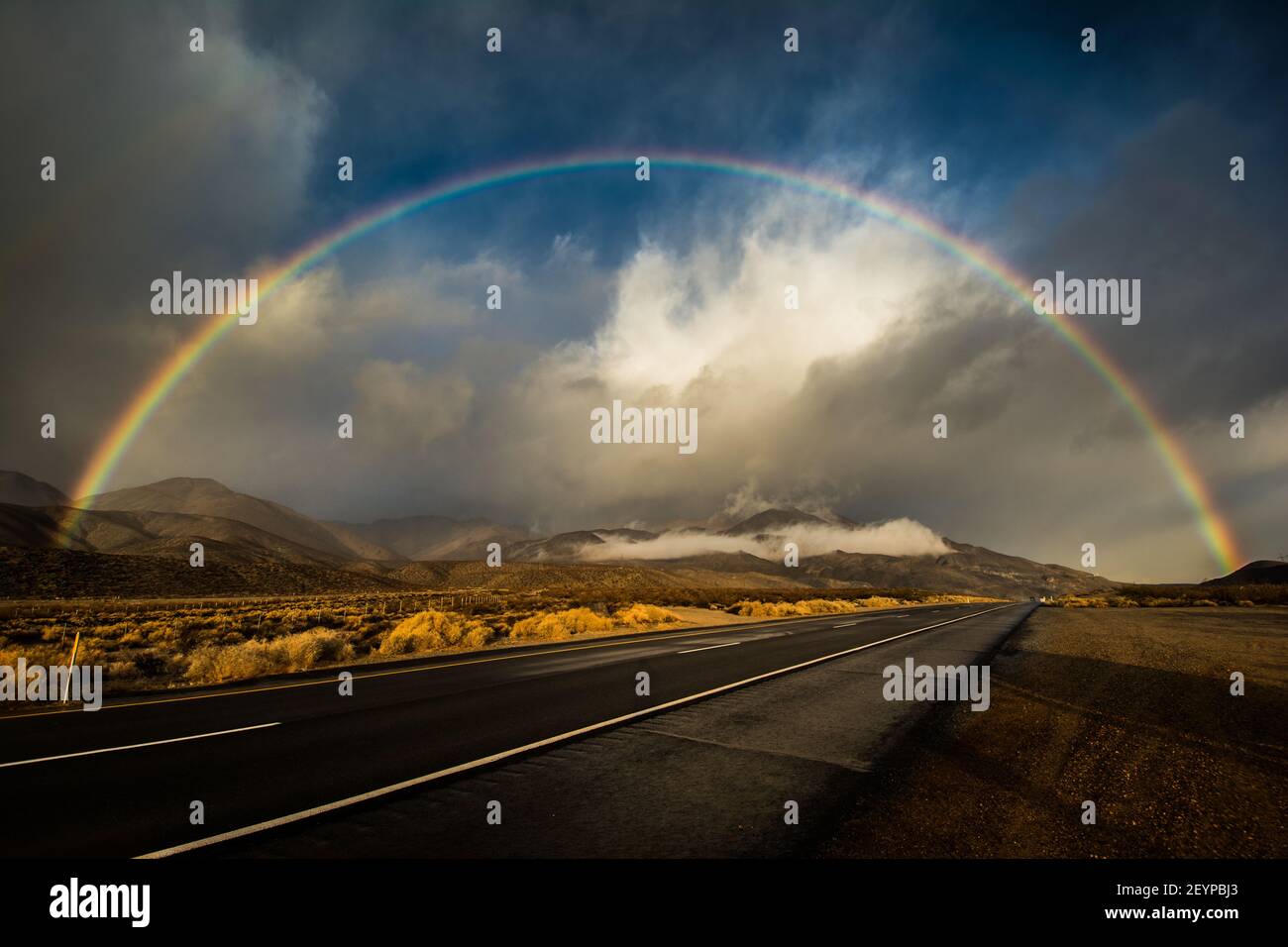 An amazing shot of a perfect rainbow from an empty highway - perfect ...