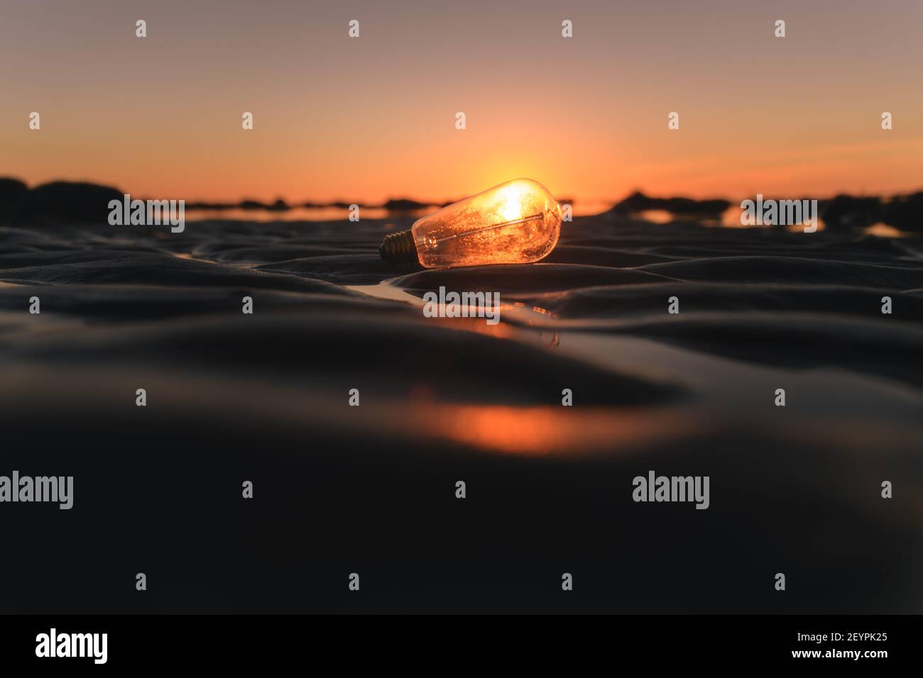 Lightbulb illuminating hi-res stock photography and images - Alamy