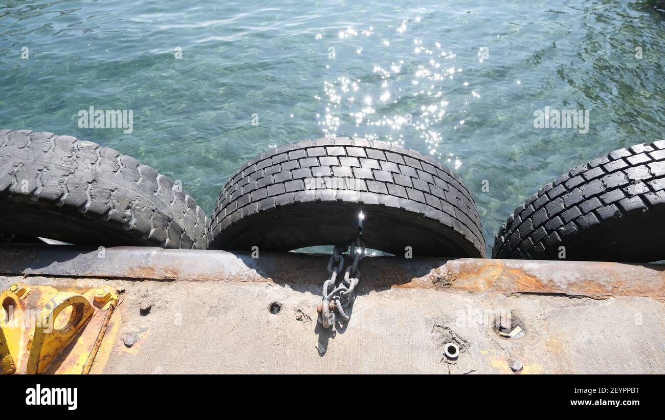 Old tyres hanging on port of karakoy istanbul bosphorus by means of ...