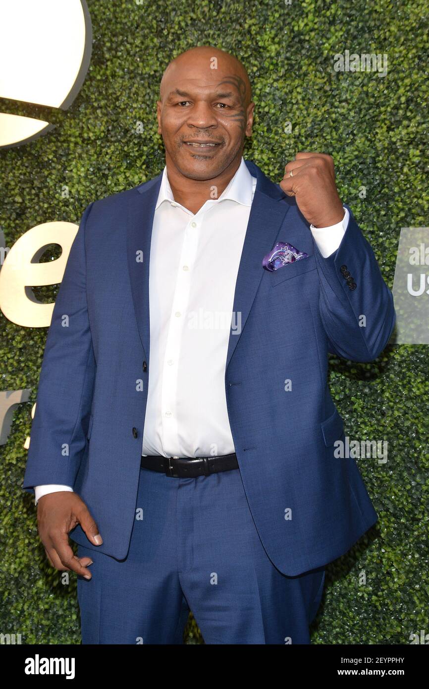 Former professional boxer Mike Tyson attends the USTA Foundation ...